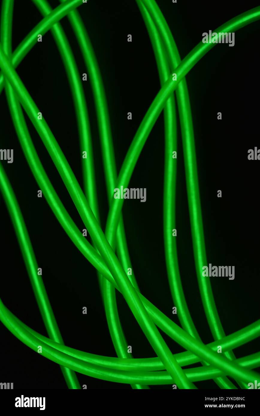 Bright glowing electroluminescent wires, light green, lime, green ...