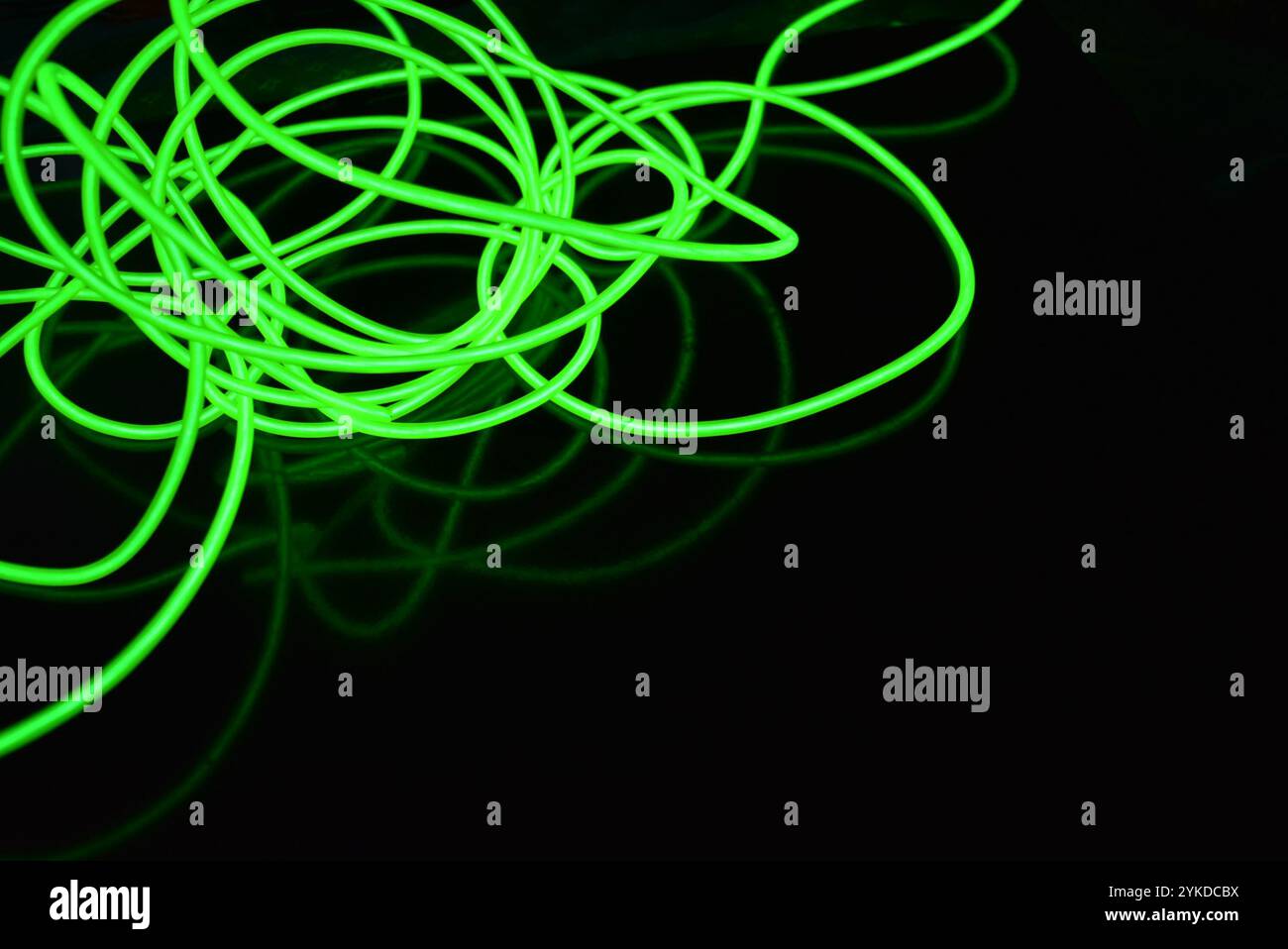 Bright glowing electroluminescent wires, light green, lime, green ...
