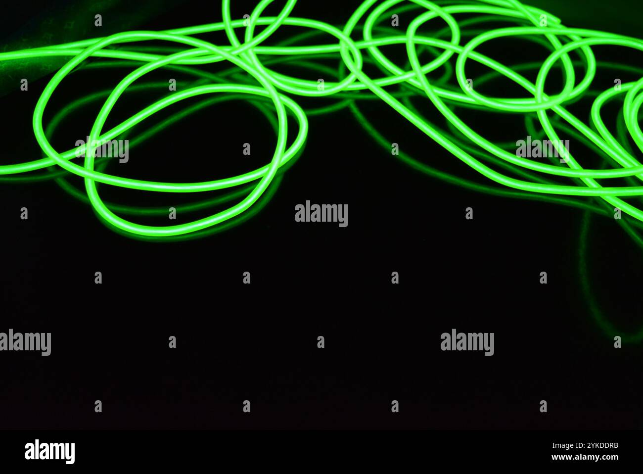 Bright glowing electroluminescent wires, light green, lime, green ...