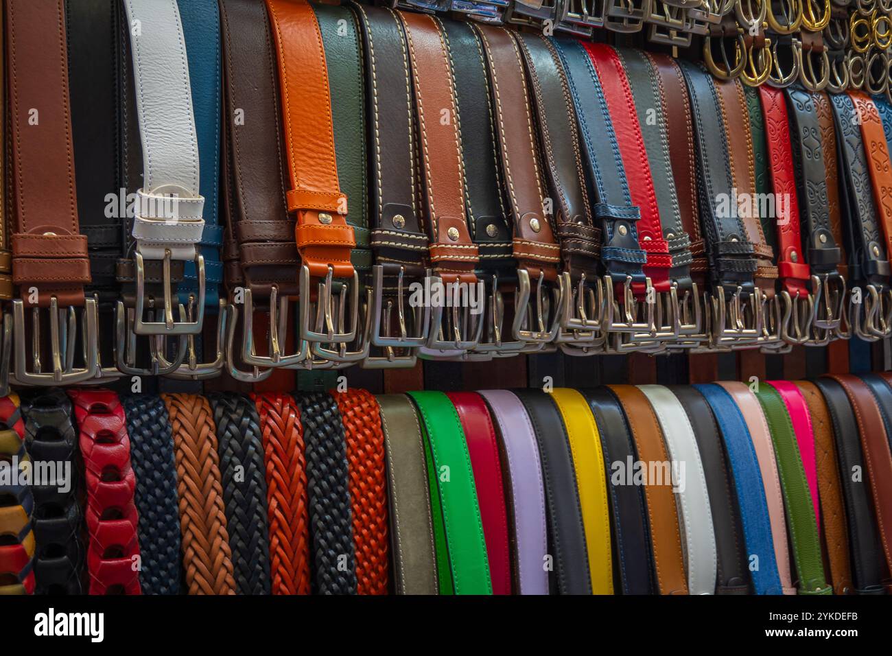 Vibrant collection of leather belts shows variety of colors and styles ...