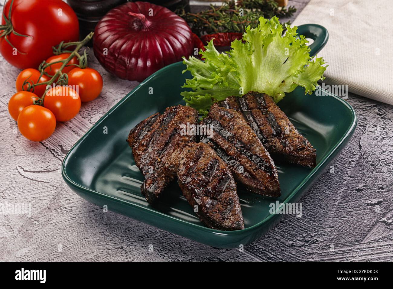 Grilled diet beef liver steak in the plate Stock Photo - Alamy
