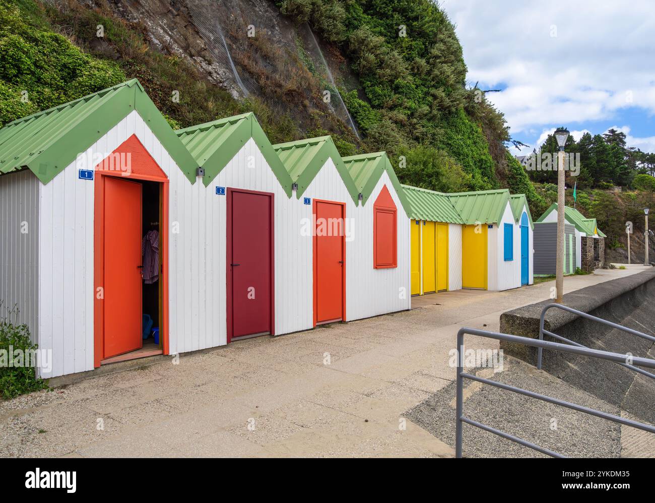 Colorful beach huts along a seaside promenade in Binic, Brittany Stock ...