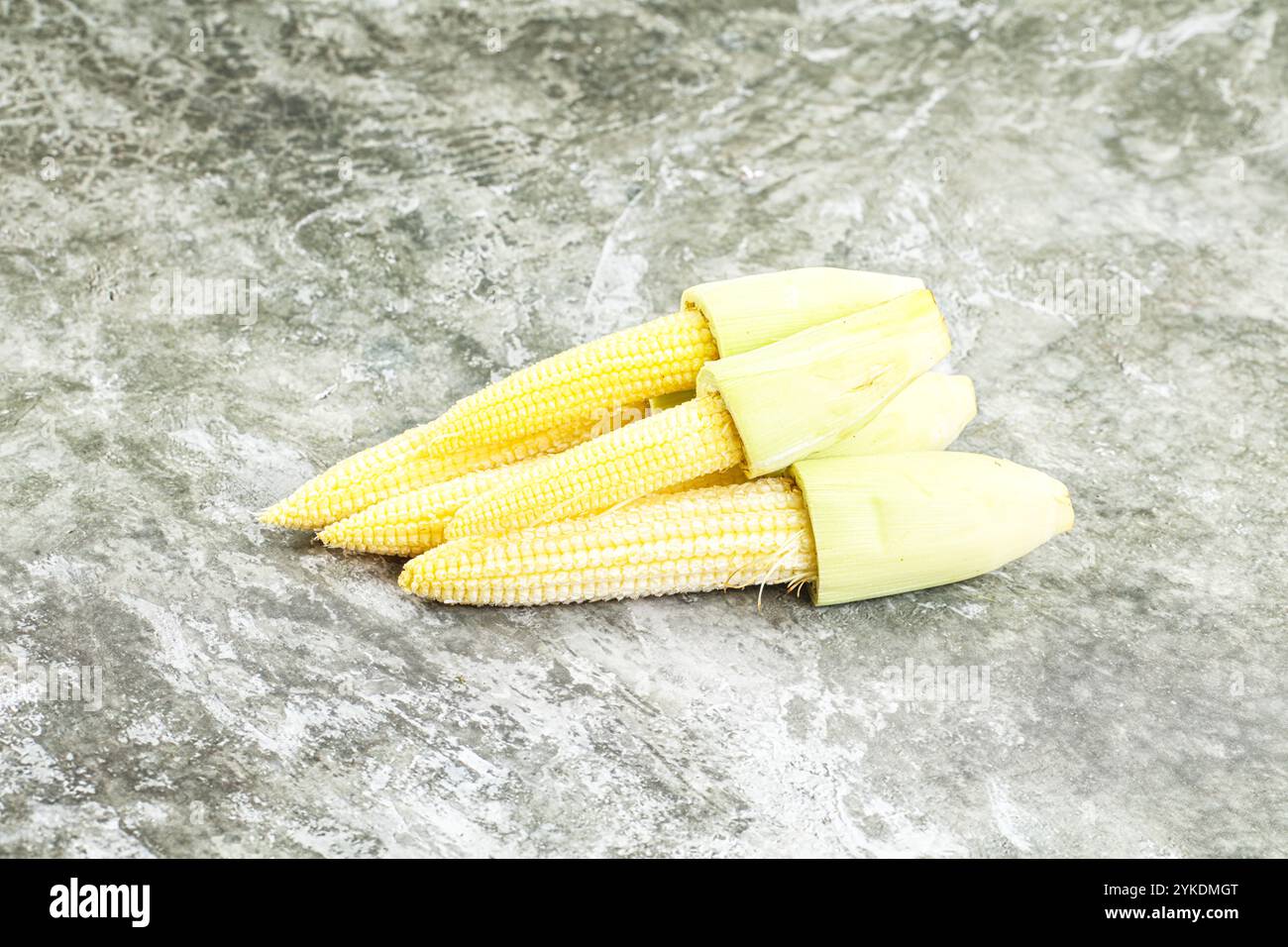 Small young sweet baby corn heap Stock Photo - Alamy