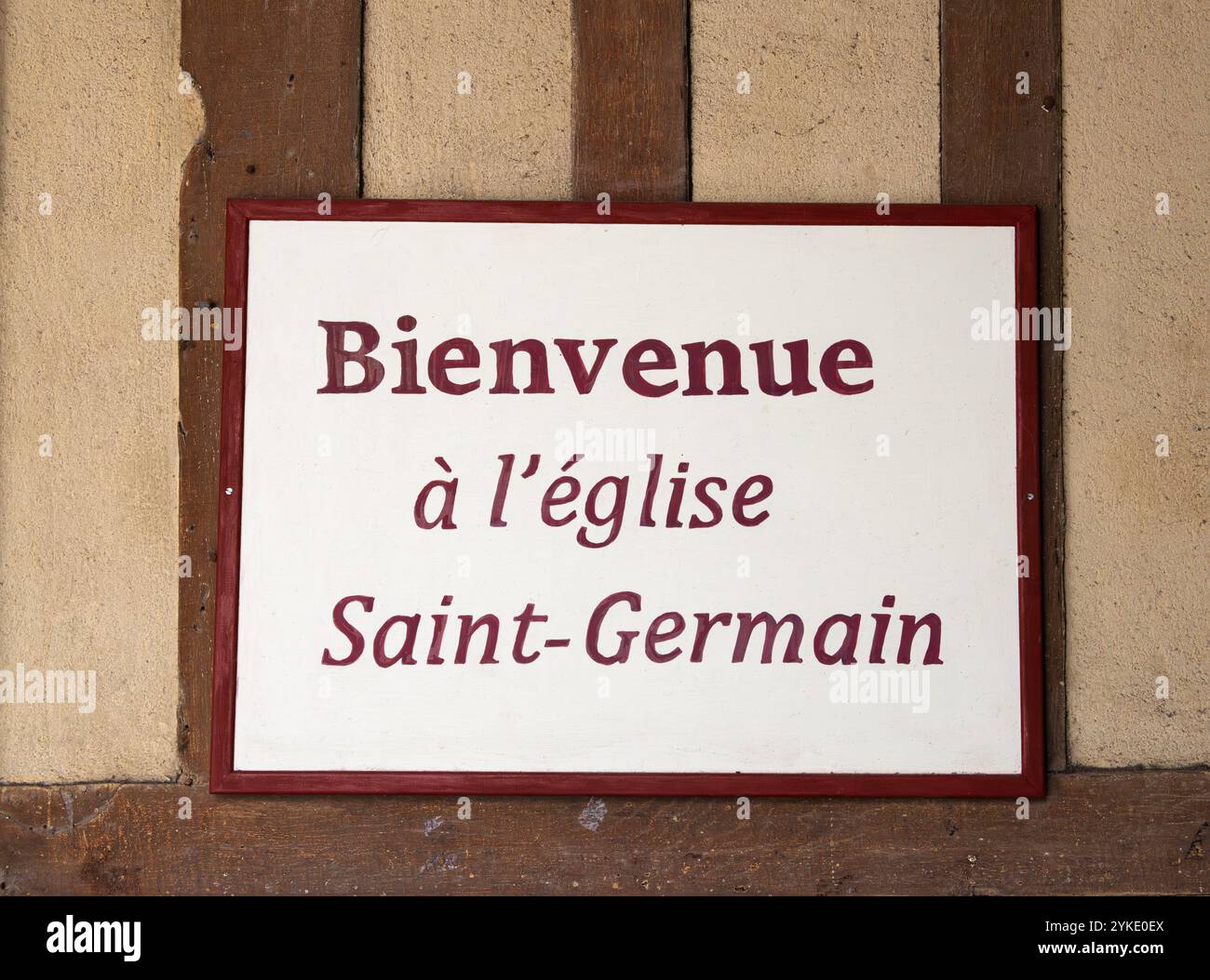 English translation: Welcome to Saint Germain Church. A sign welcoming ...