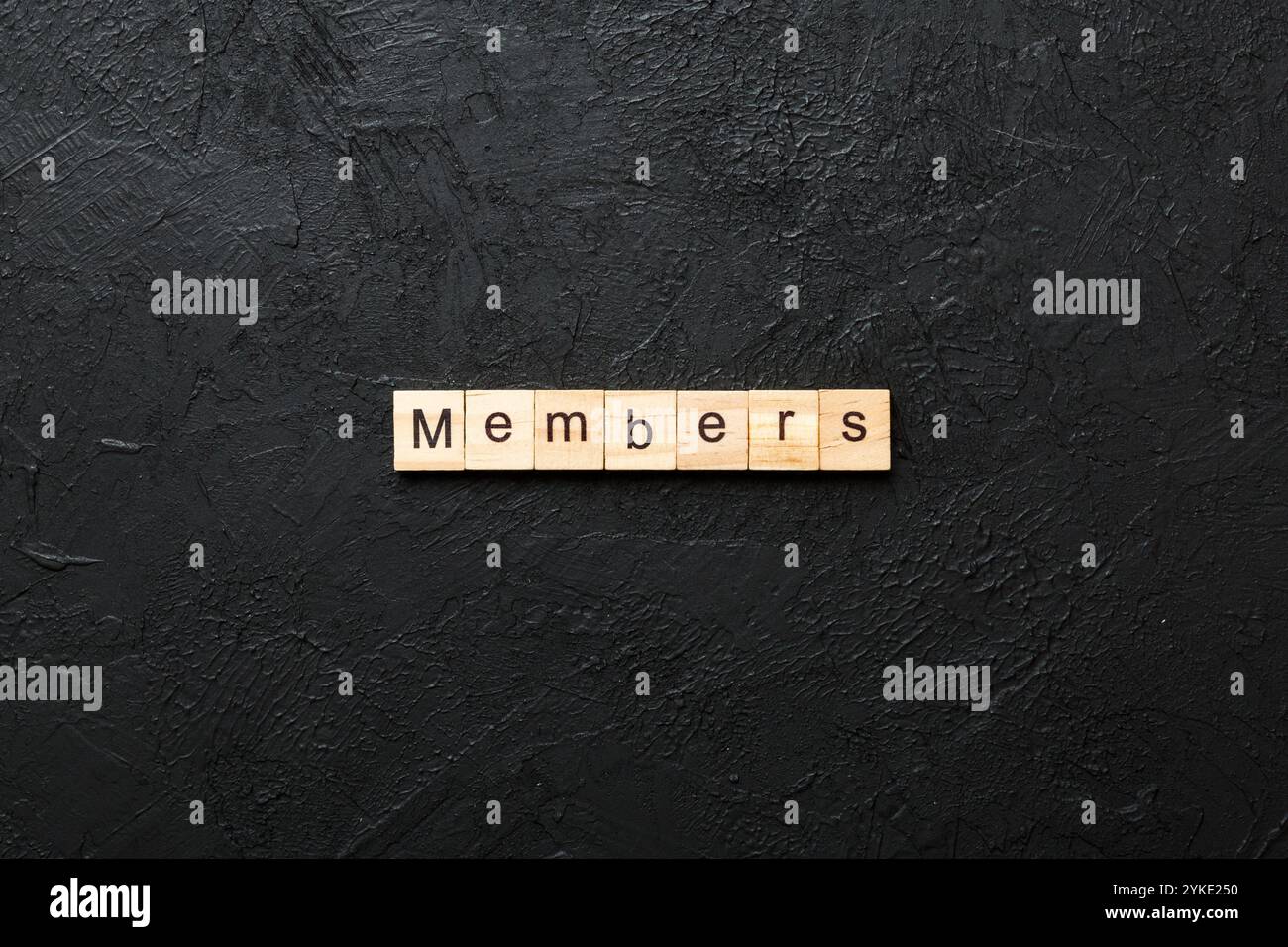 Members word written on wood block. Members text on cement table for ...