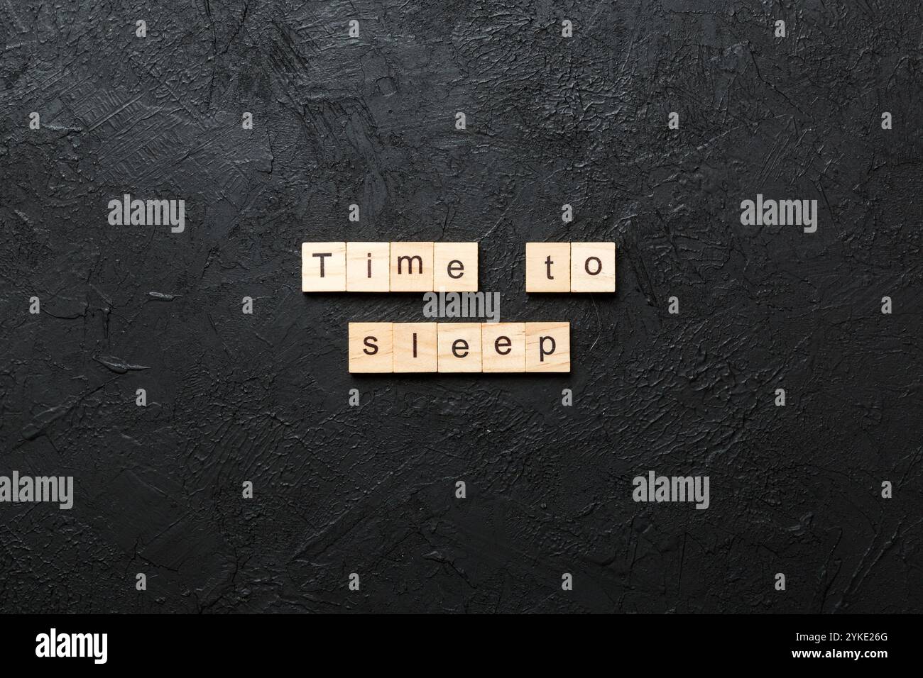 time to sleep word written on wood block. time to sleep text on cement ...