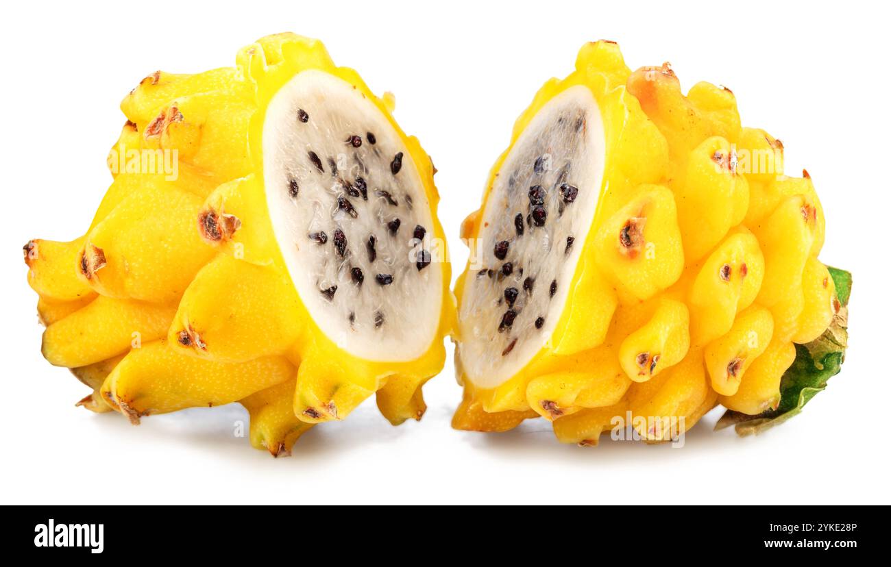 Yellow pitahaya or yellow dragon fruit cross cuts with white flesh and ...