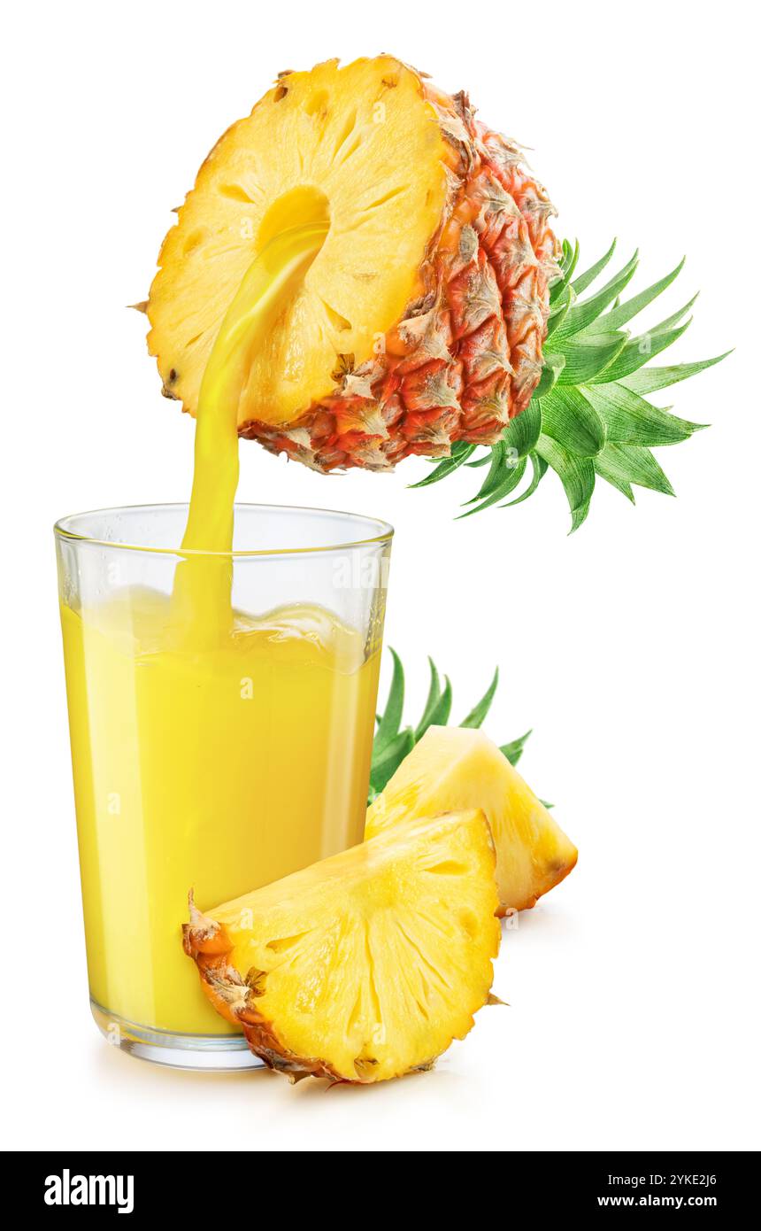 Glass of pineapple juice and pouring juice from ripe fruit isolated on ...