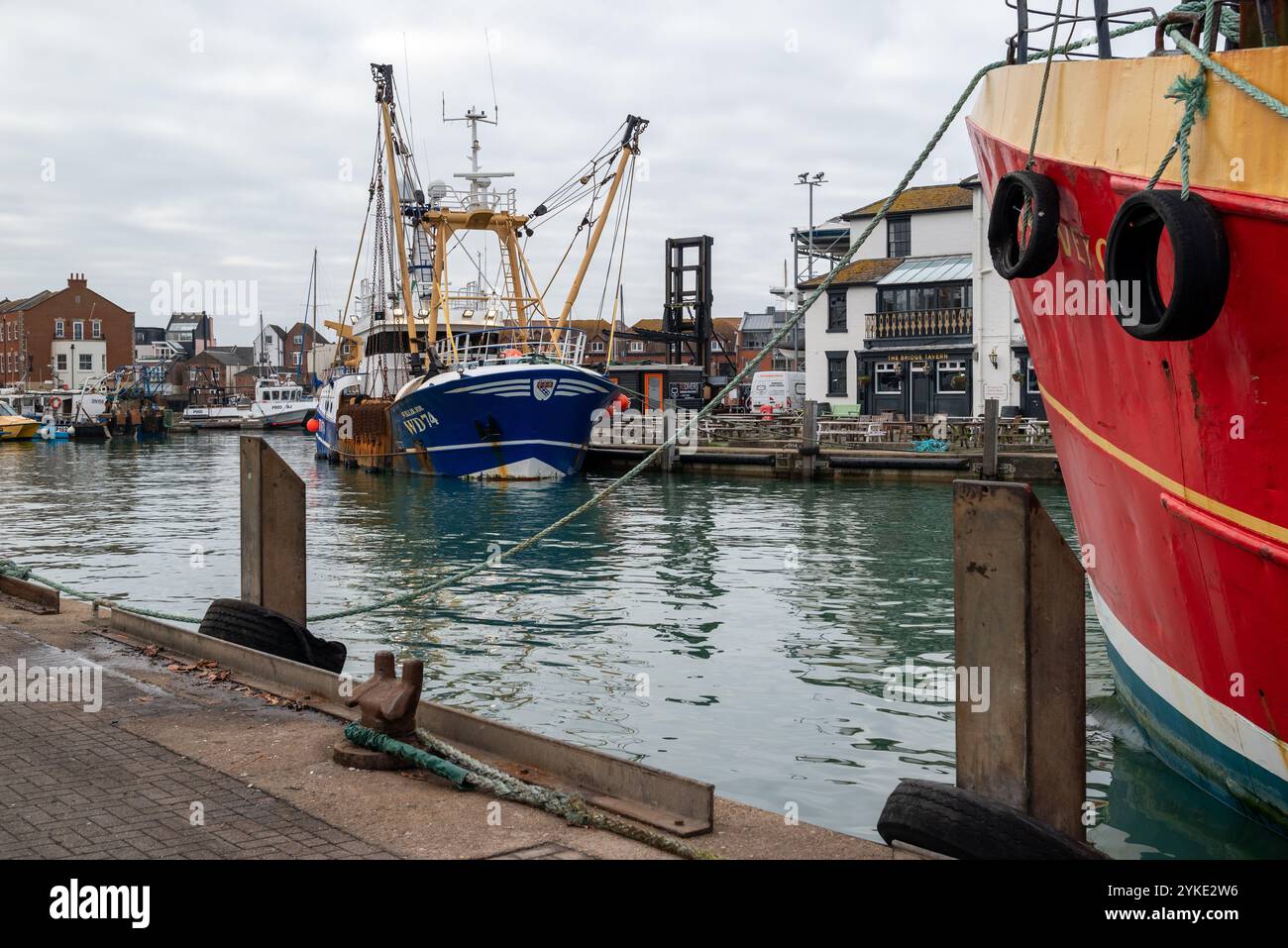 Large fishing boats in the Camber dock, Portsmouth at high tide ...