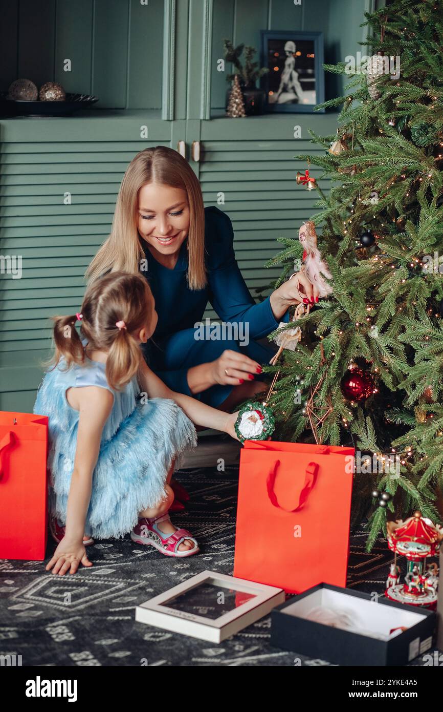 family celebrating Christmas. Sharing Christmas presents Stock Photo ...