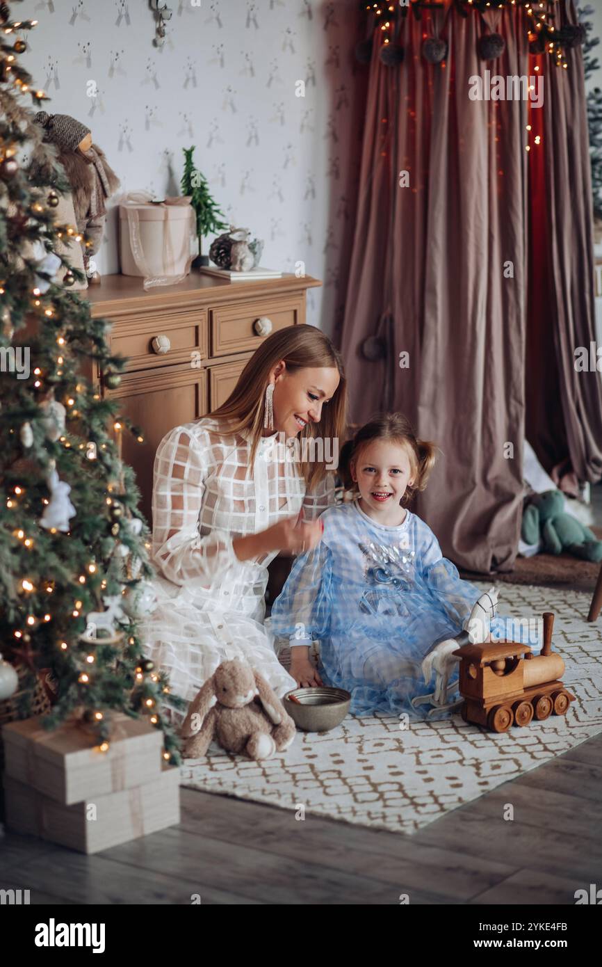 family celebrating Christmas. Sharing Christmas presents Stock Photo ...