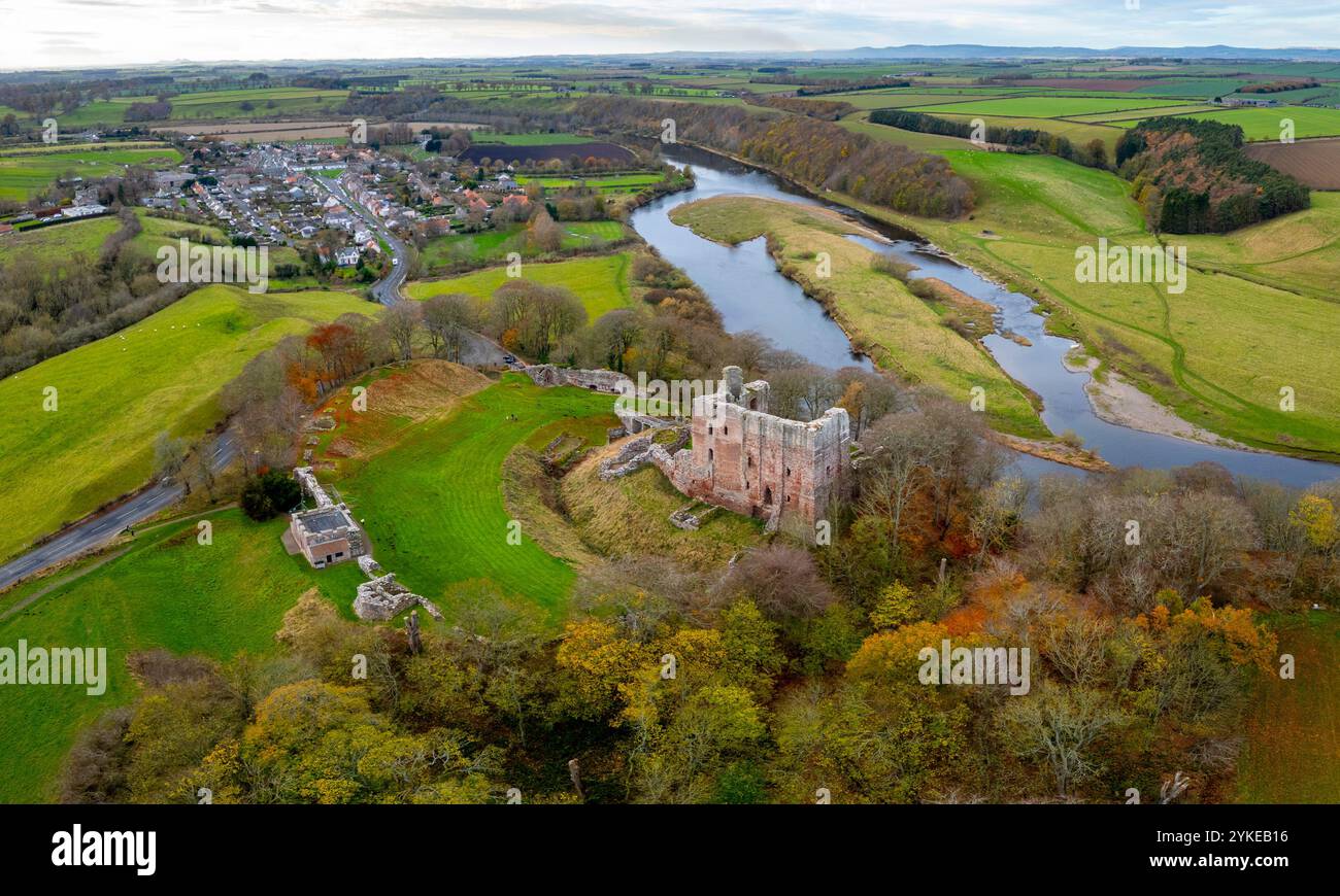 Aerial view of village of Norham and Norham Castle beside River Tweed ...