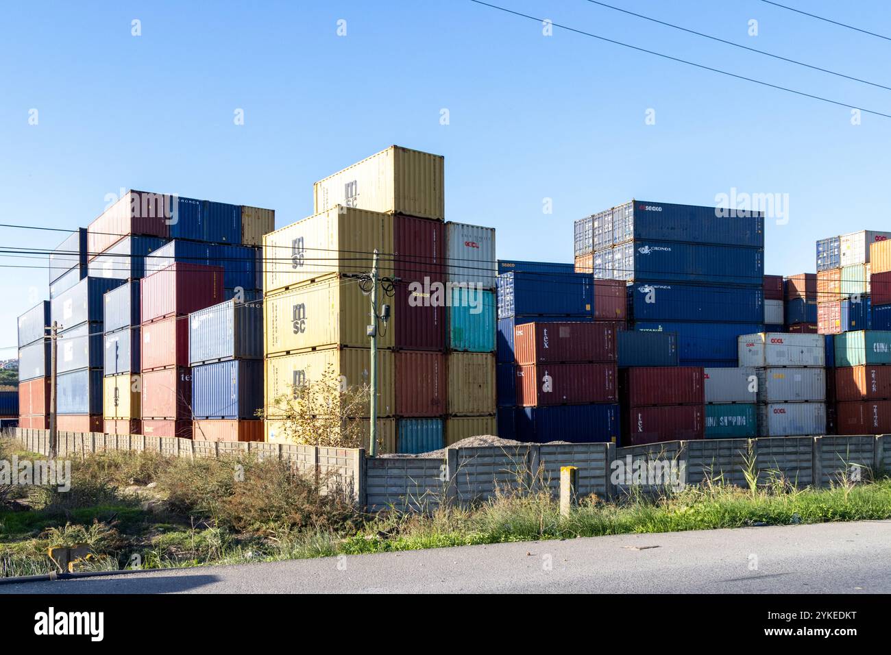 Cargo containers sit stacked hi-res stock photography and images - Alamy