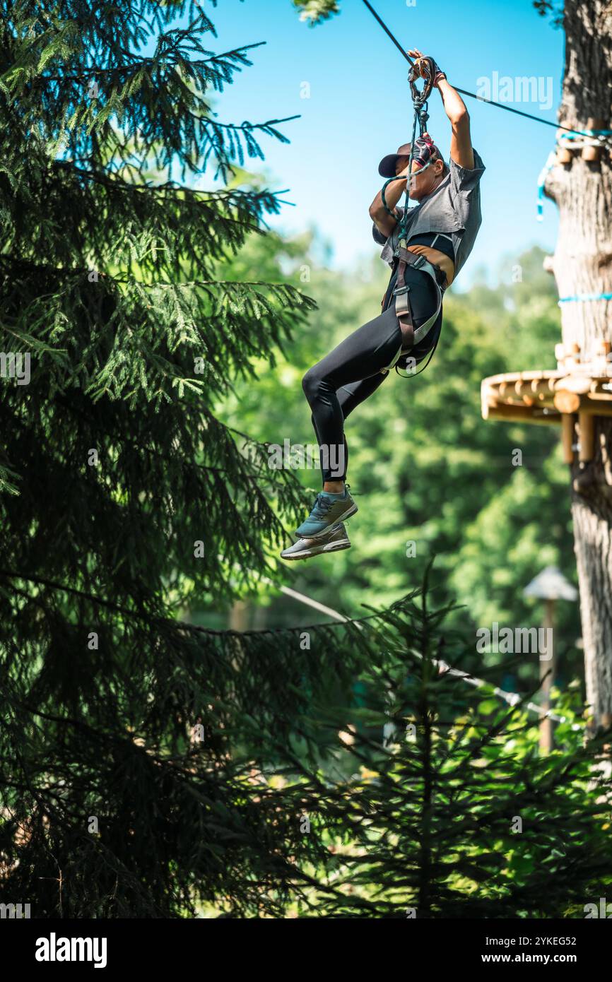 Enjoy a thrilling ziplining adventure above the ground, gliding through ...