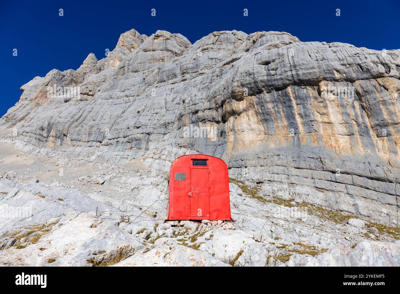 Alpine bivaco mountain hut shelter located in rugged alpine terrain ...