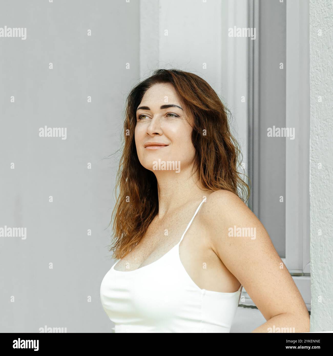 Woman serene expression gazing into distance hi-res stock photography ...