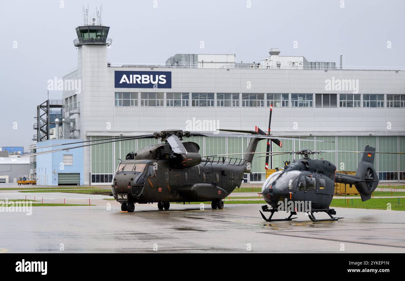 18 November 2024, Bavaria, Donauwörth: H145-M (r) and CH-53 helicopters ...