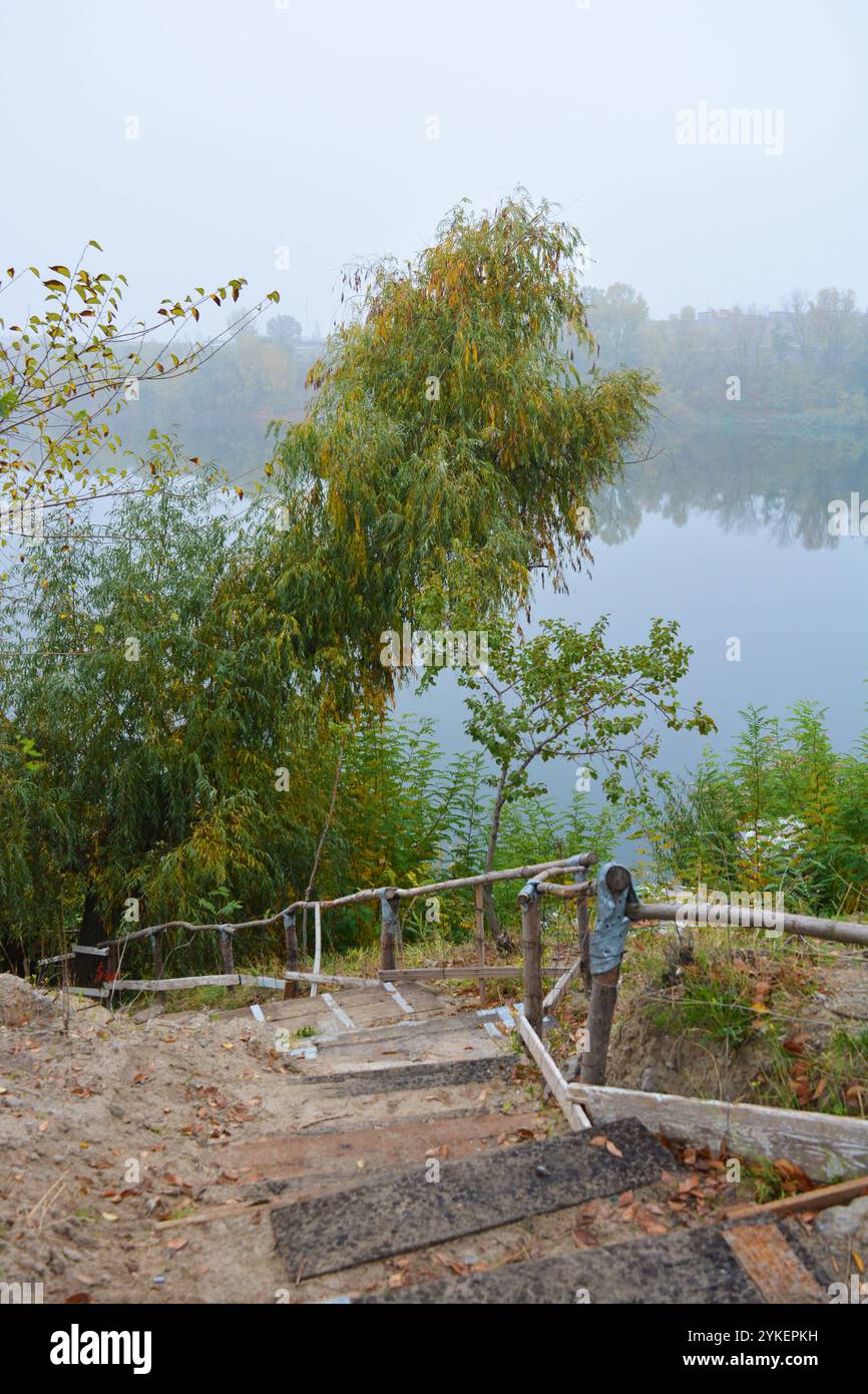 Very bright colorful landscape of a clean lake with green and yellow ...