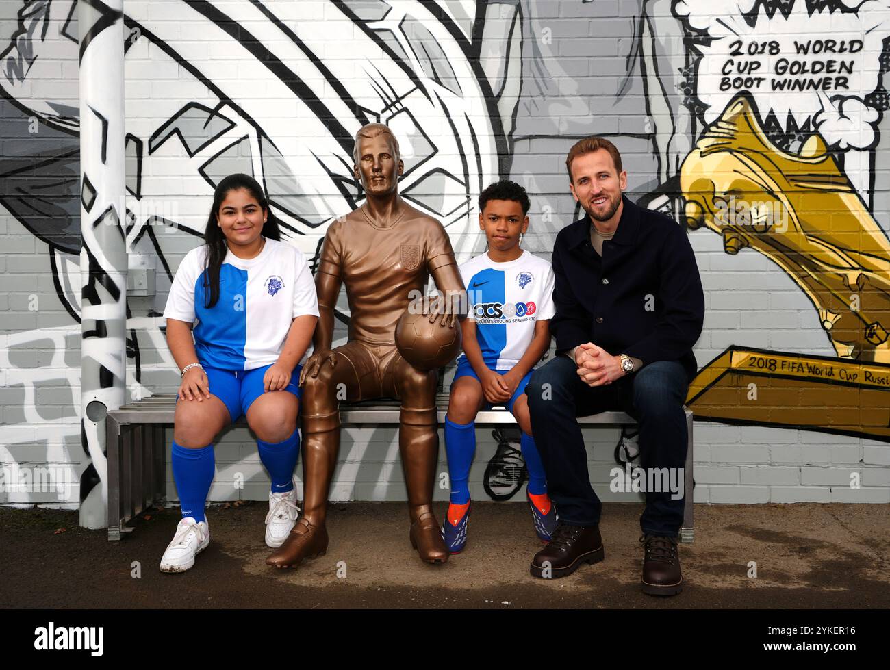 Harry Kane (right) following the unveiling of a statue of himself at ...