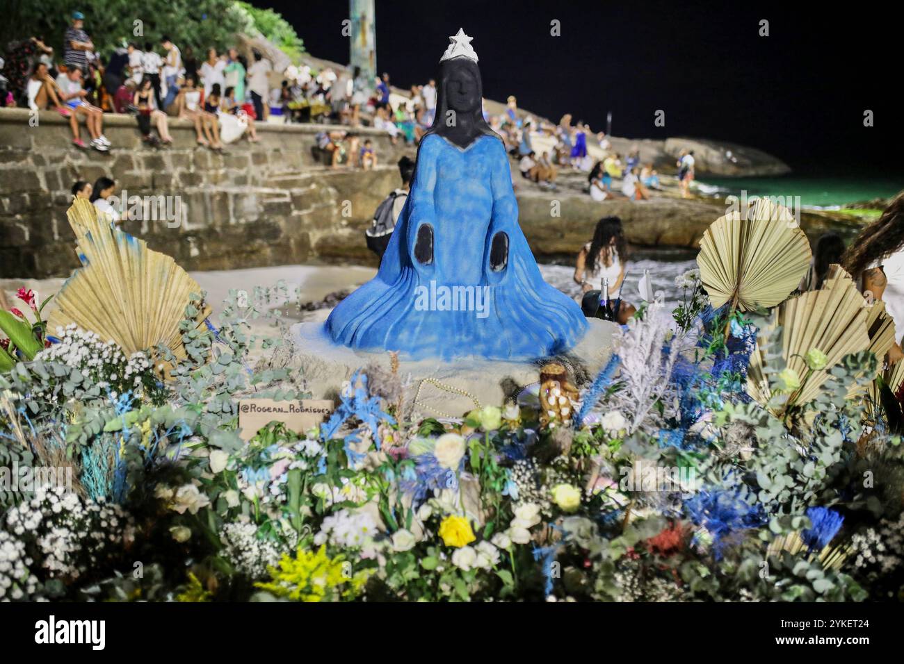 An altar filled with offerings celebrates the goddess Iemanjá during ...