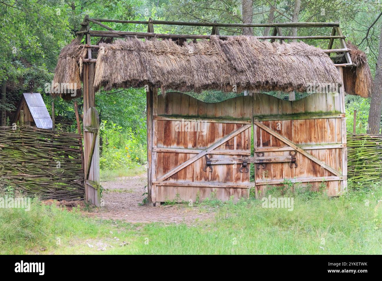 Old wooden gate in countryside. Traditional wooden farmhouse. Village ...