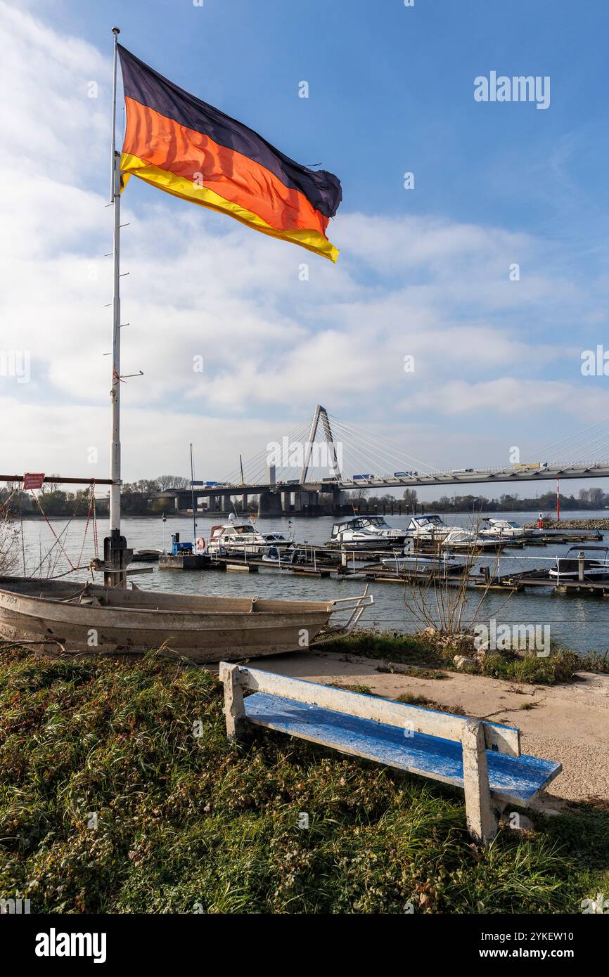 German flag in front of the construction site of the new river Rhine ...