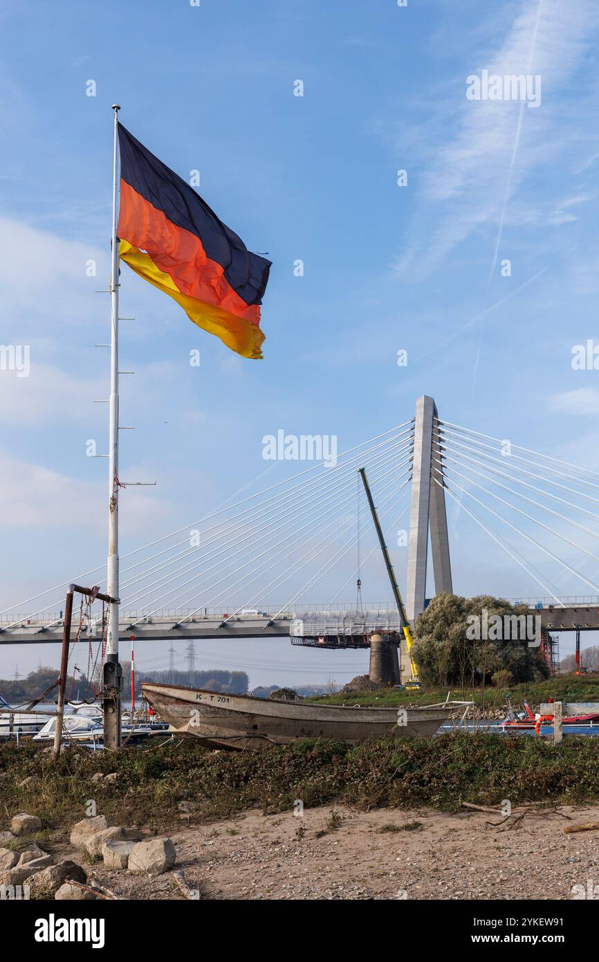 German flag in front of the construction site of the new river Rhine ...