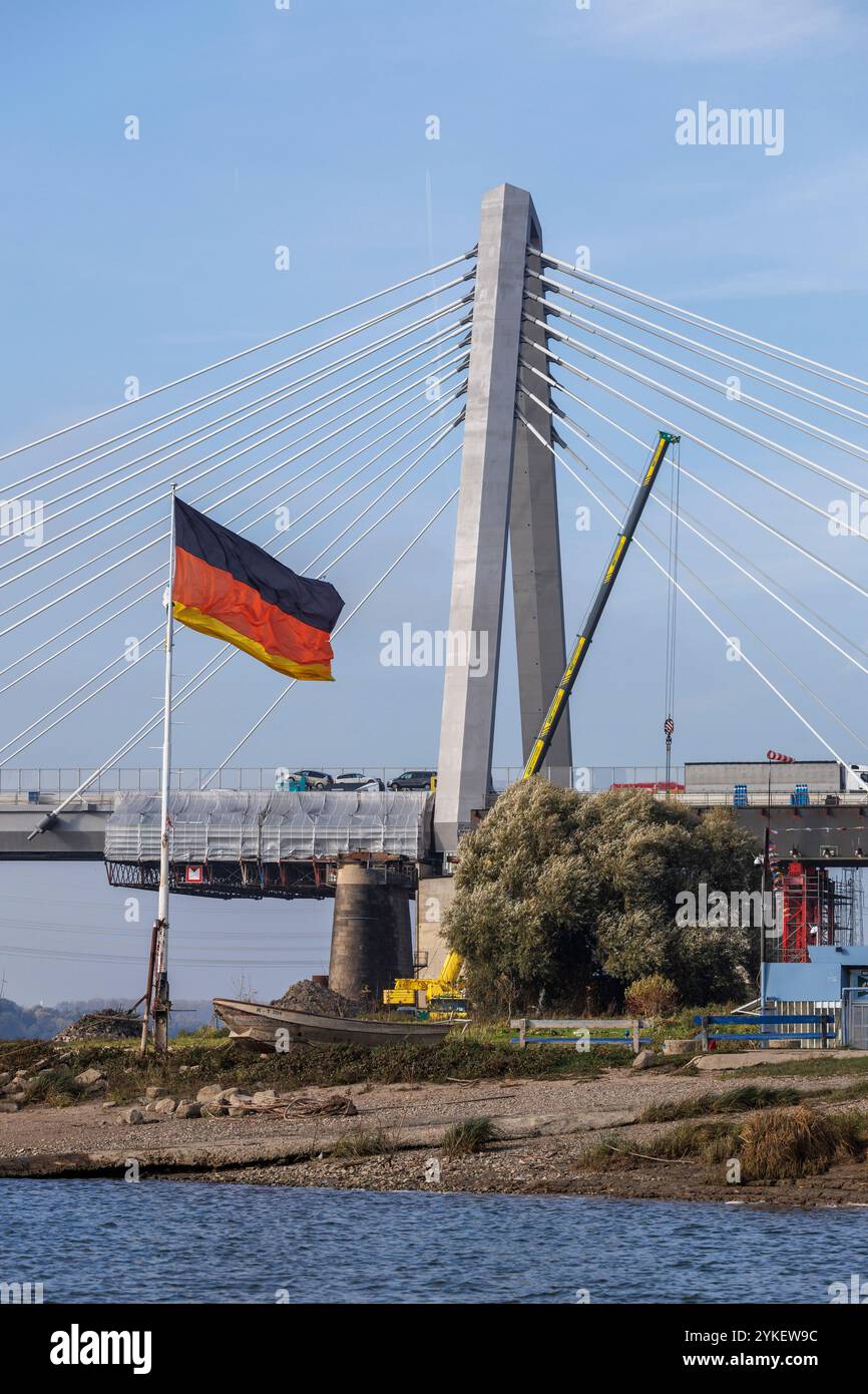 German flag in front of the construction site of the new river Rhine ...