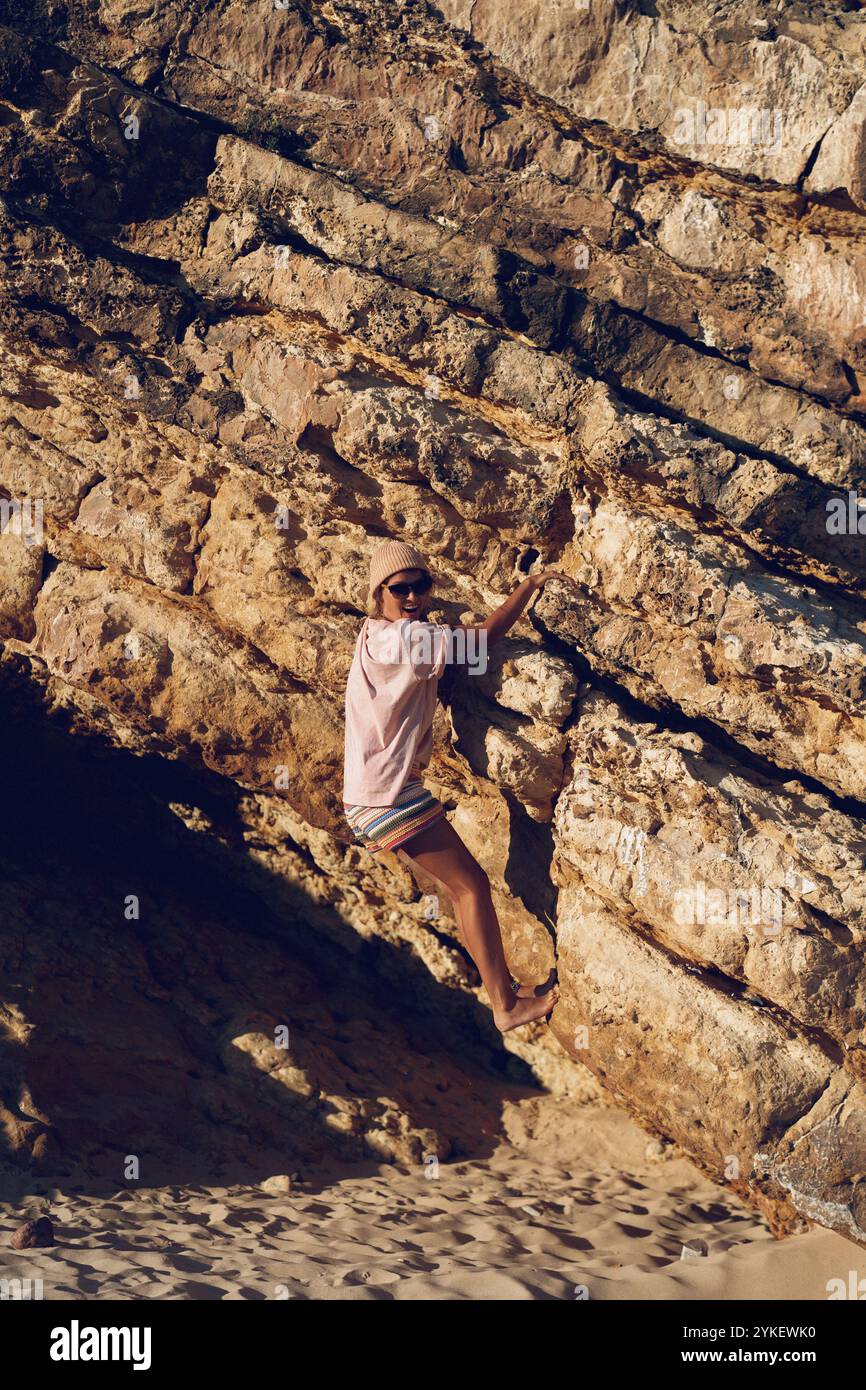 Rock climbing on beach hi-res stock photography and images - Alamy