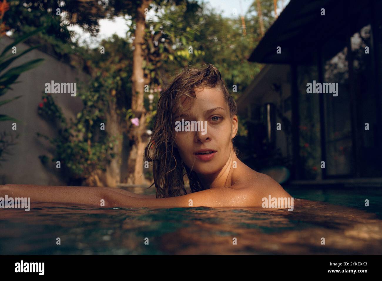 Old woman smiling in the pool hi-res stock photography and images - Alamy