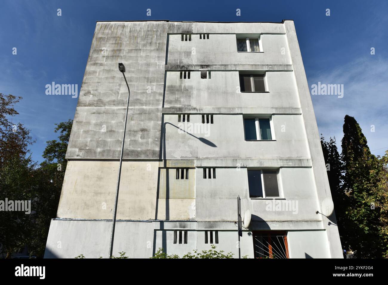Typical facade of concrete panel building. Post Soviet flat of blocks ...