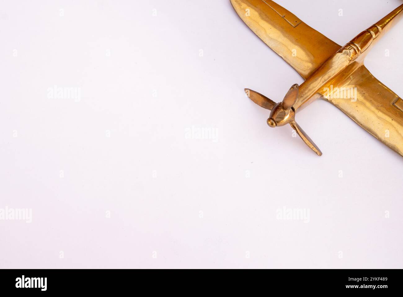 Vintage WWII Brass Airplane Spitfire Model on White Background Historic ...