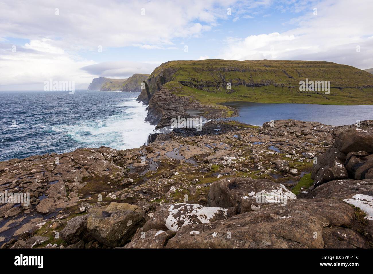 View of rocky Bosdalafossur waterfall and Leitisvatn lake above the ...