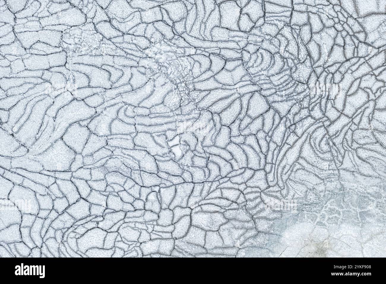 Detailed image showcasing the complex patterns of dry, cracked mud ...