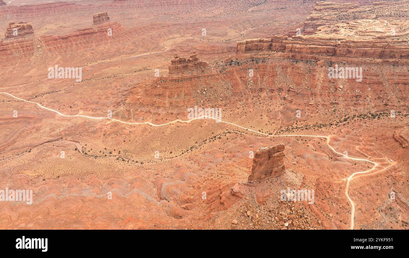 From above, a drone captures the intricate patterns of winding dirt ...