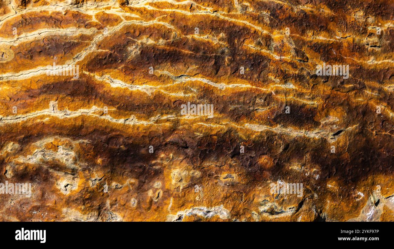 Close-up photo of sulfur rocks showcasing distinct, layered patterns ...