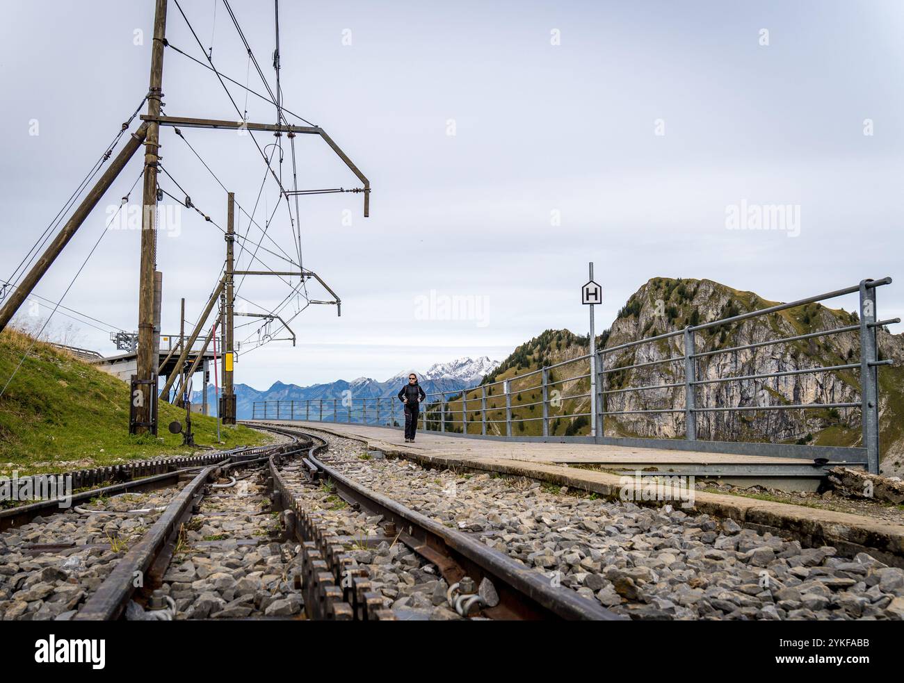 Hiker walks along railway hi-res stock photography and images - Alamy