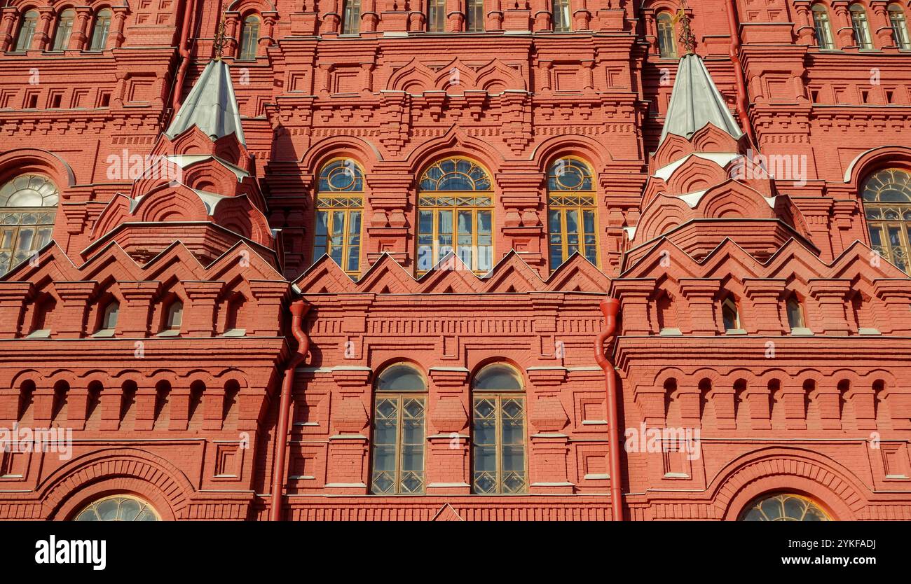 An ornate red brick facade in Moscow displays intricate architectural ...