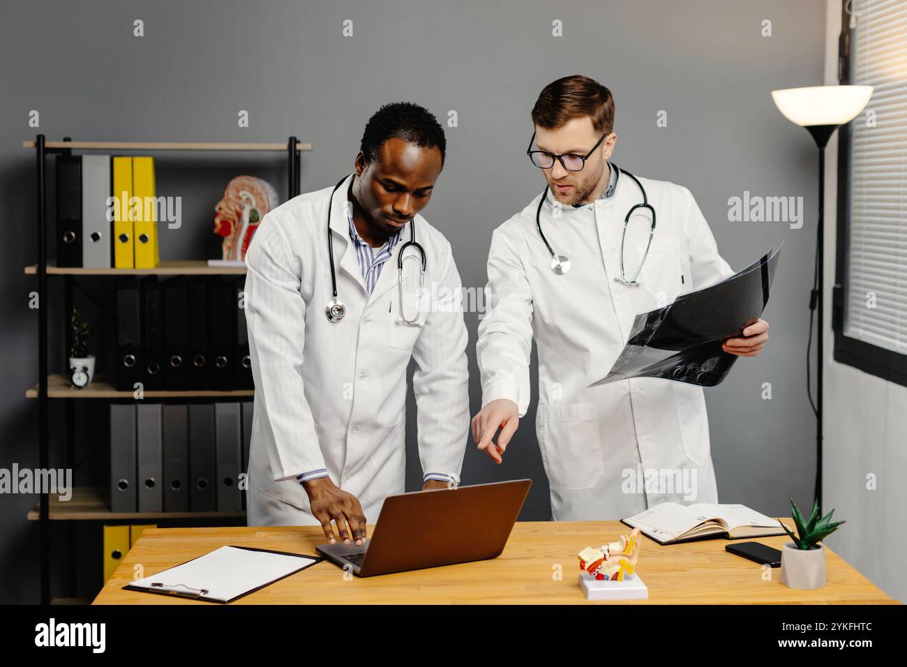 Male doctor analyzing brain xray hi-res stock photography and images ...