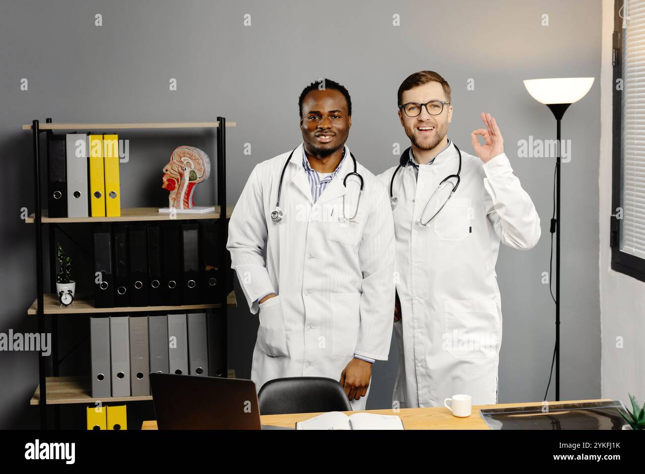 Two scientists in white coats hi-res stock photography and images - Alamy