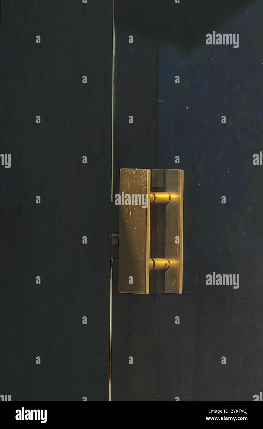 Golden Handrail Elegance: A Glimpse of Modern Design Stock Photo - Alamy