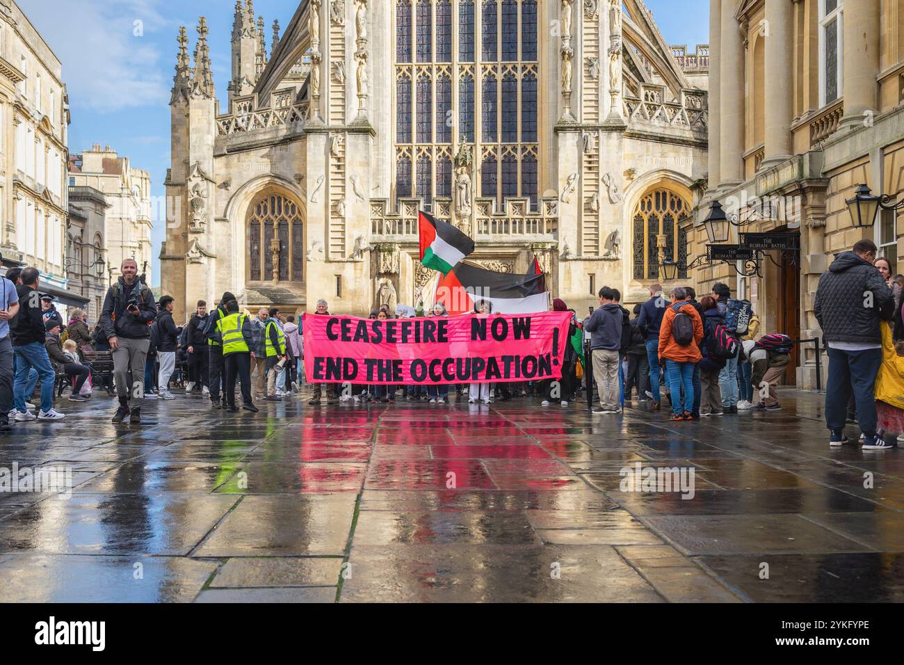 Bath, UK. 04/11/23. Pro-Palestinian supporters carrying a ceasefire ...