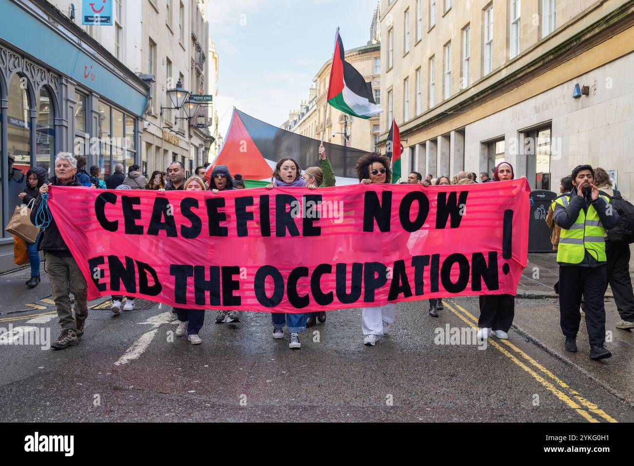 Bath, UK. 04/11/23. Pro-Palestinian supporters carrying a ceasefire ...