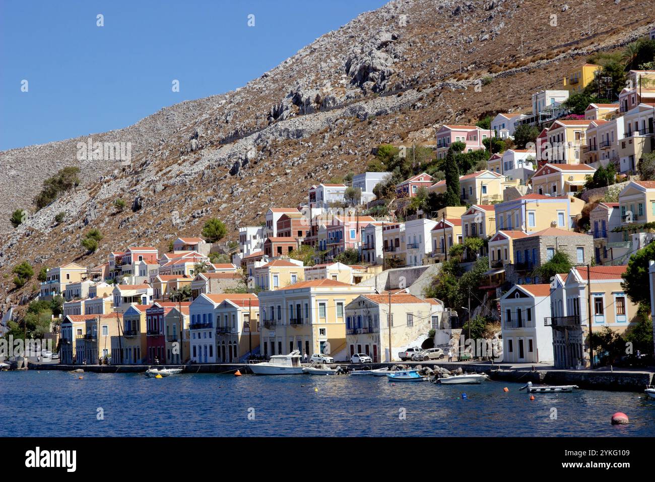 The harbour port of Symi town on the Greek island of Symi in the ...