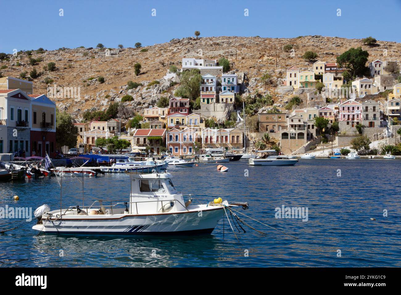 The harbour port of Symi town on the Greek island of Symi in the ...