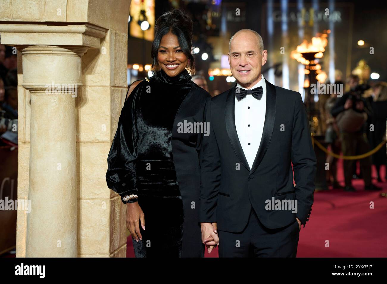 Tracy Robbins, left, and Brian Robbins pose for photographers upon ...