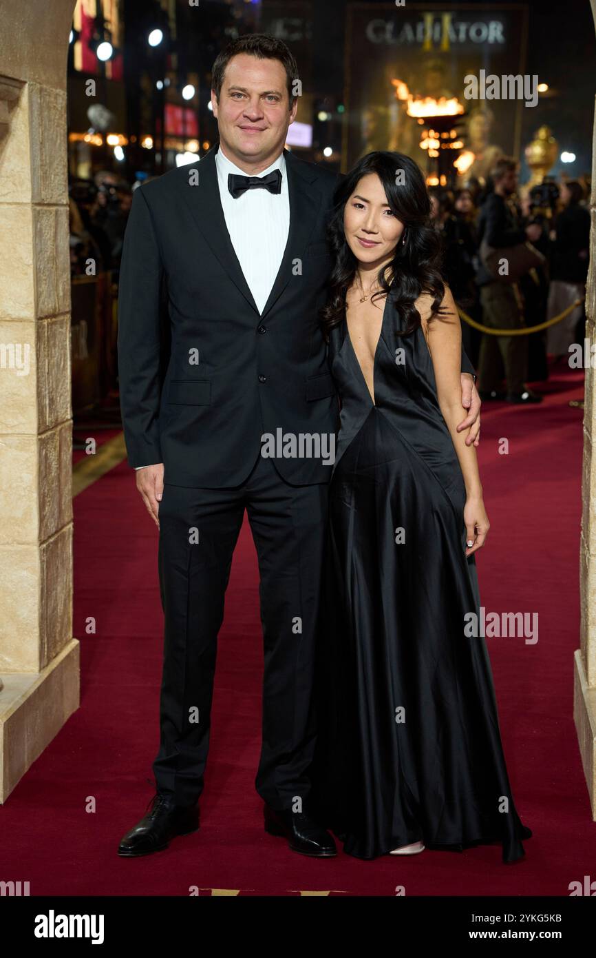 Michael Pruss, left, and Marika Takeuchi Pruss pose for photographers ...
