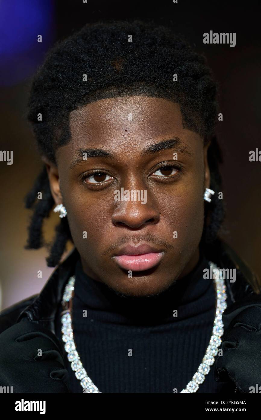 Whydee poses for photographers upon arrival at the premiere of the film ...