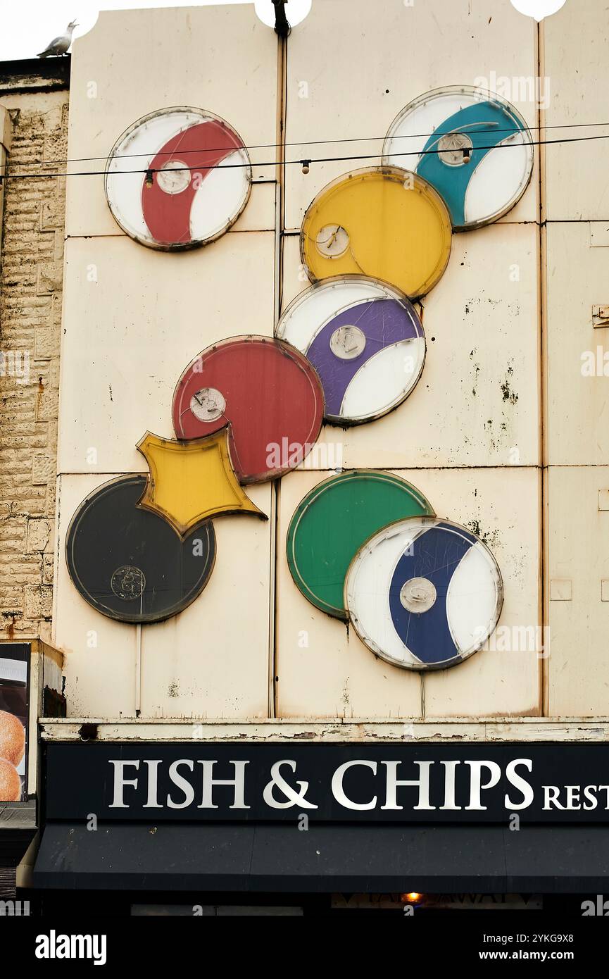 Giant pool balls attached to wall above fish and chips shop in ...
