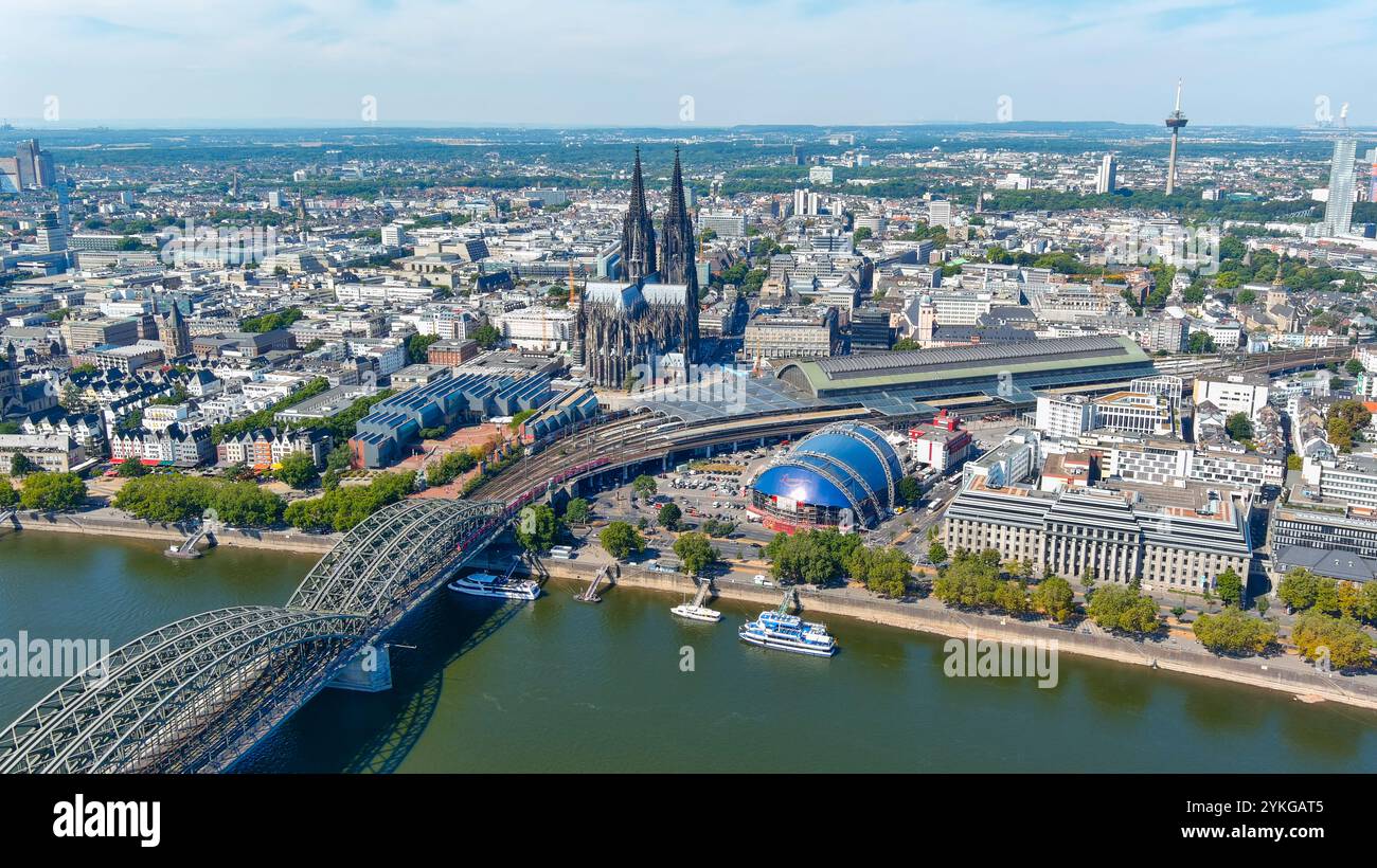 Cologne’s iconic cathedral and Hohenzollern Bridge across the Rhine ...